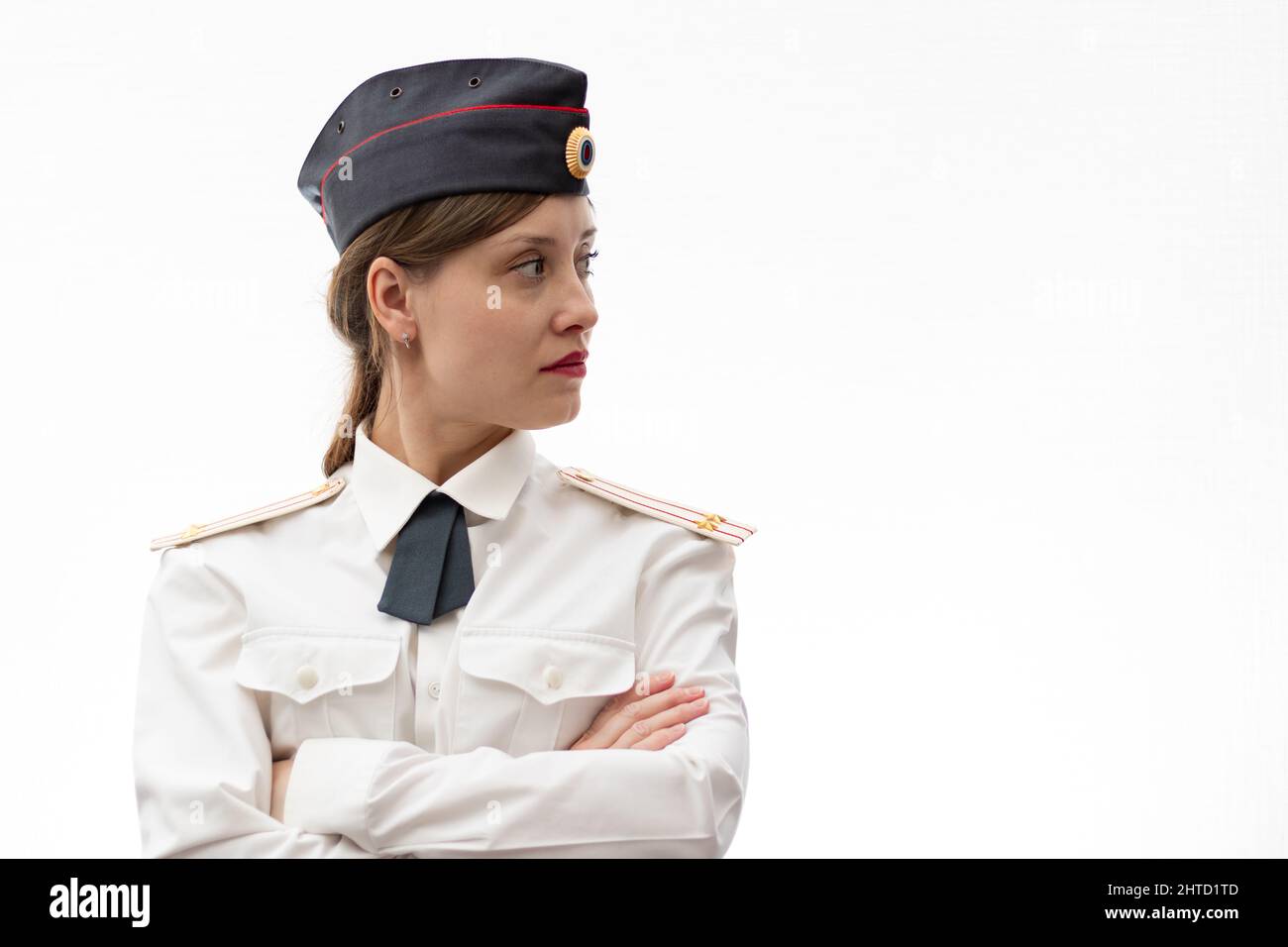 A beautiful young female Russian police officer in dress uniform in a ...