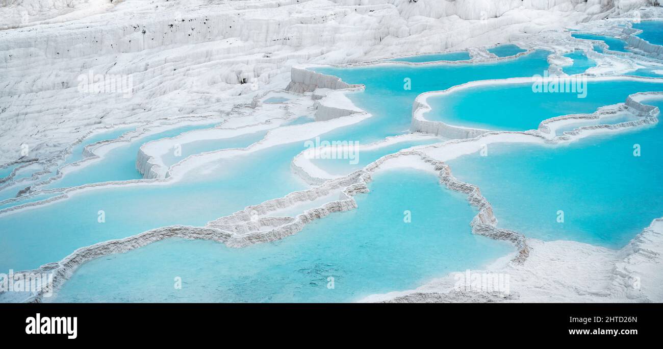 Natural travertine pools and terraces in Pamukkale. Cotton castle in ...