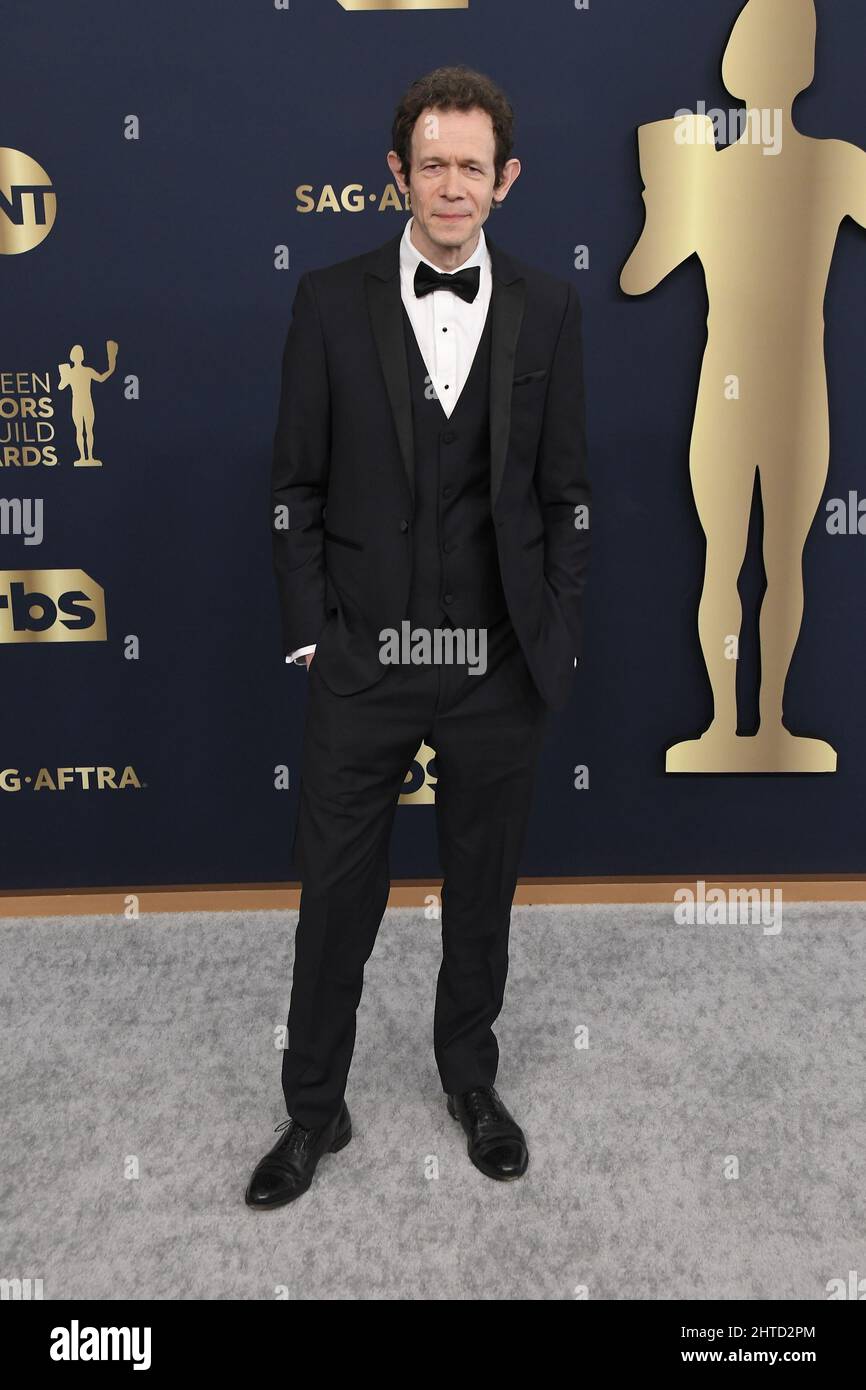 Los Angeles, USA. 27th Feb, 2022. Adam Godley arrives at the 28th ...