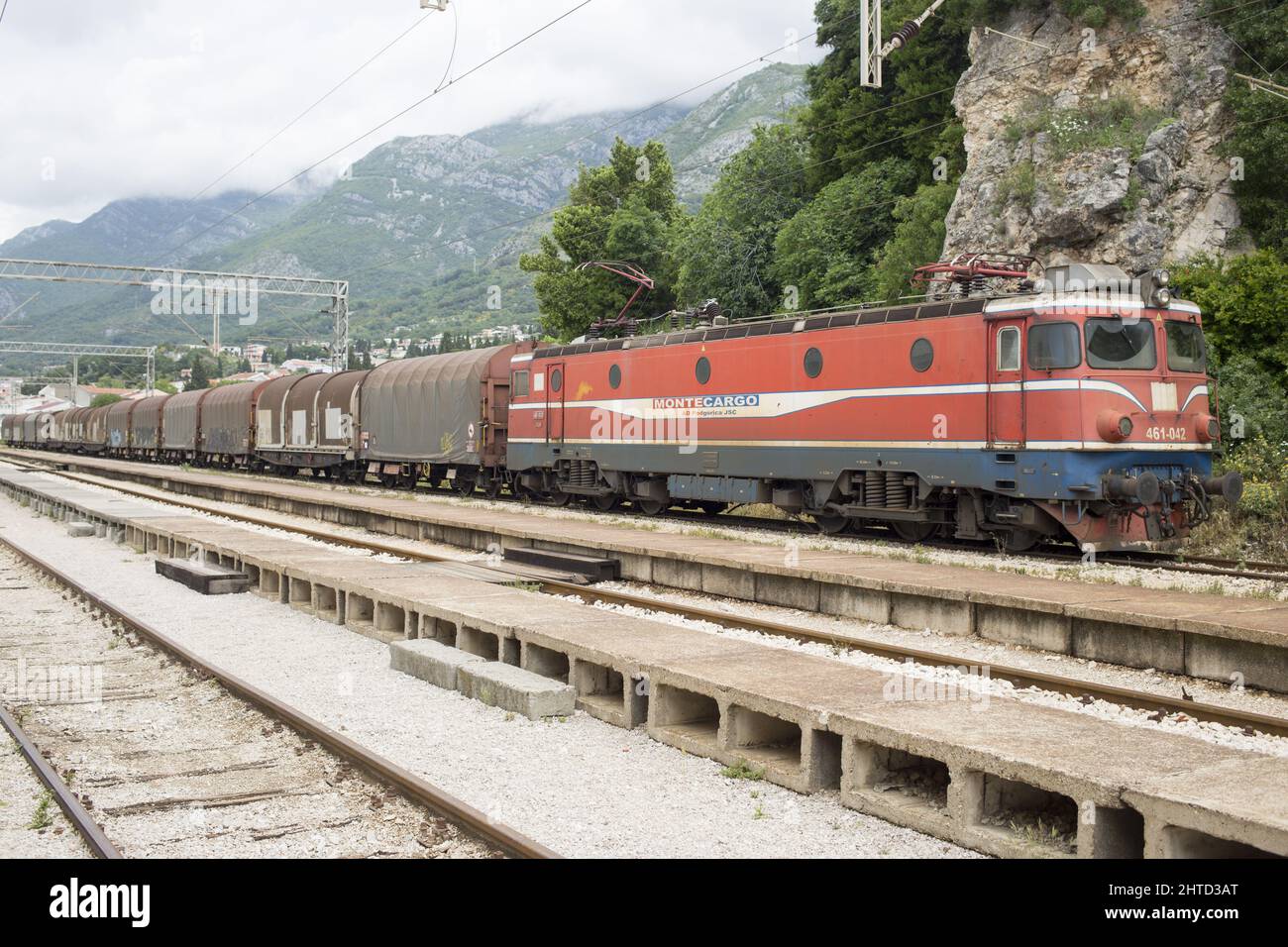 Beautiful shot of a red train at the railway station in Montenegro ...