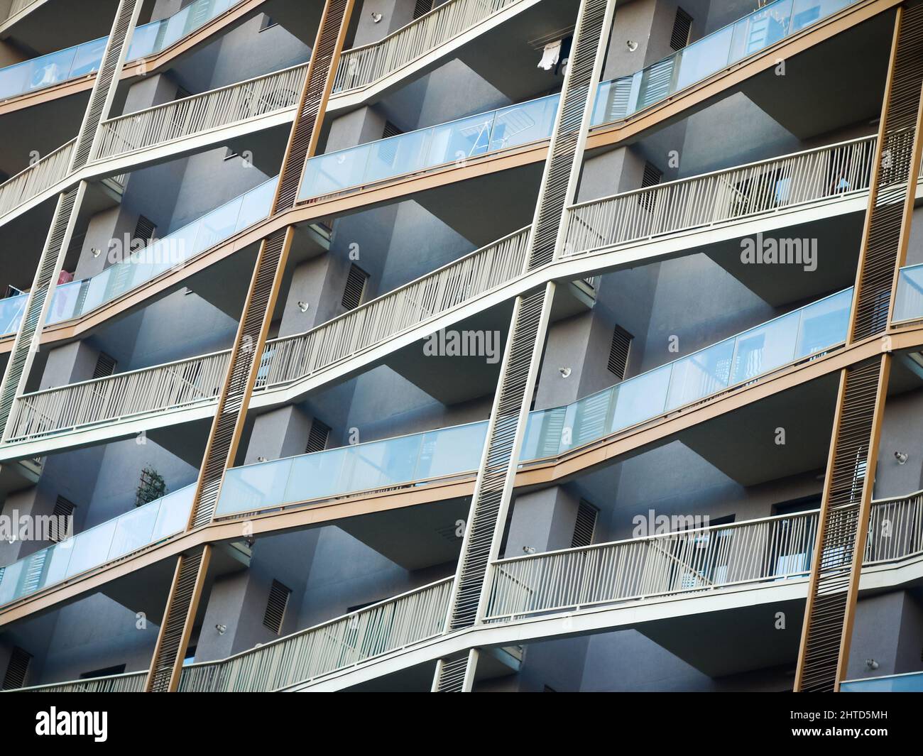 Modern multistory residential building with blue balconies Stock Photo ...