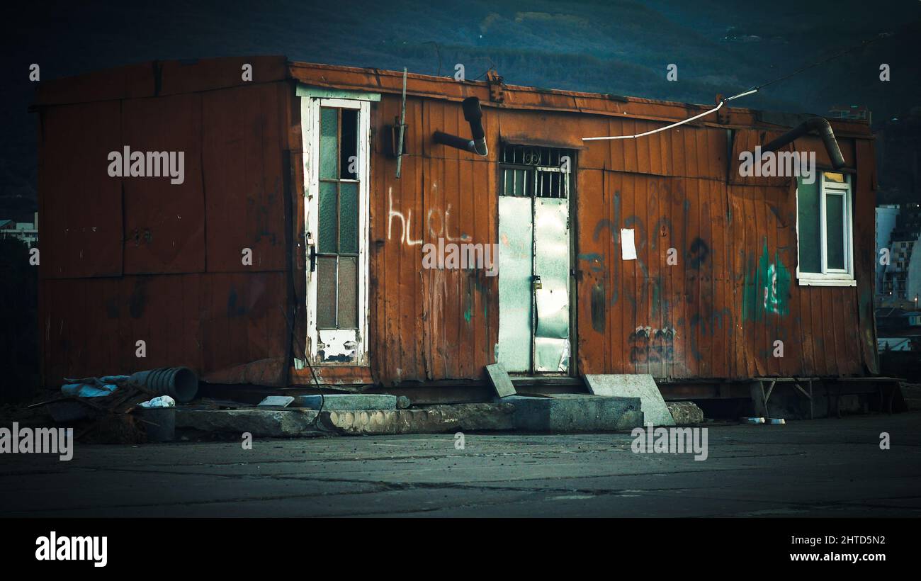 Metal shipping container transformed into a living cabin Stock Photo ...