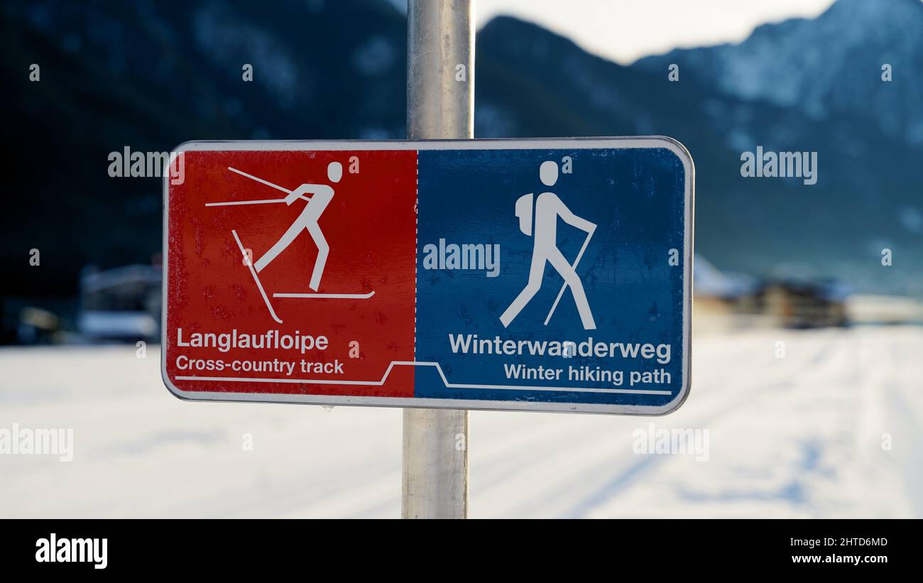 Signs for a combined cross-country track and winter walking path in ...