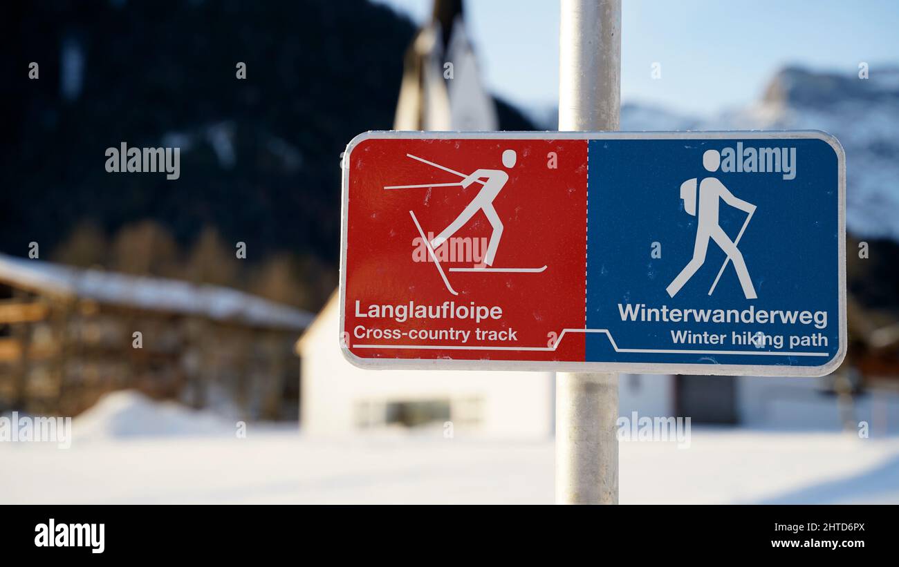 Signs for a combined cross-country track and winter walking path in ...
