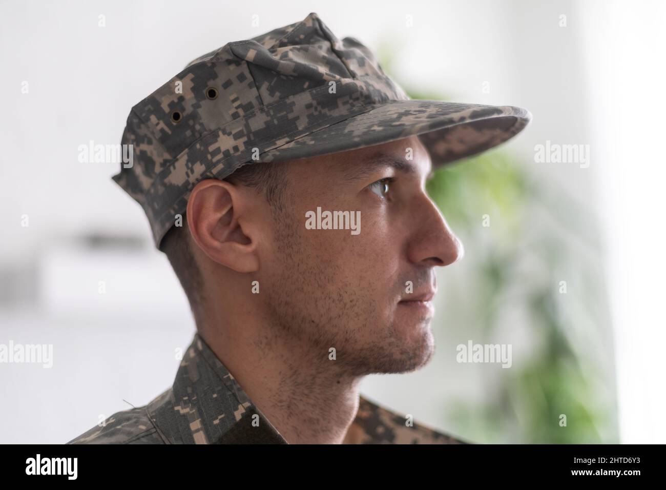 Photo of soldier in camouflaged uniform close-up view Stock Photo - Alamy