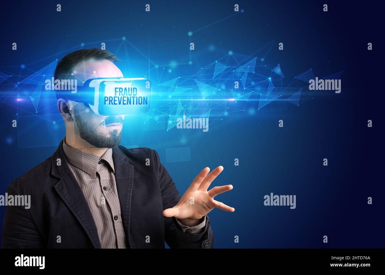Businessman looking through Virtual Reality glasses, virtual security ...