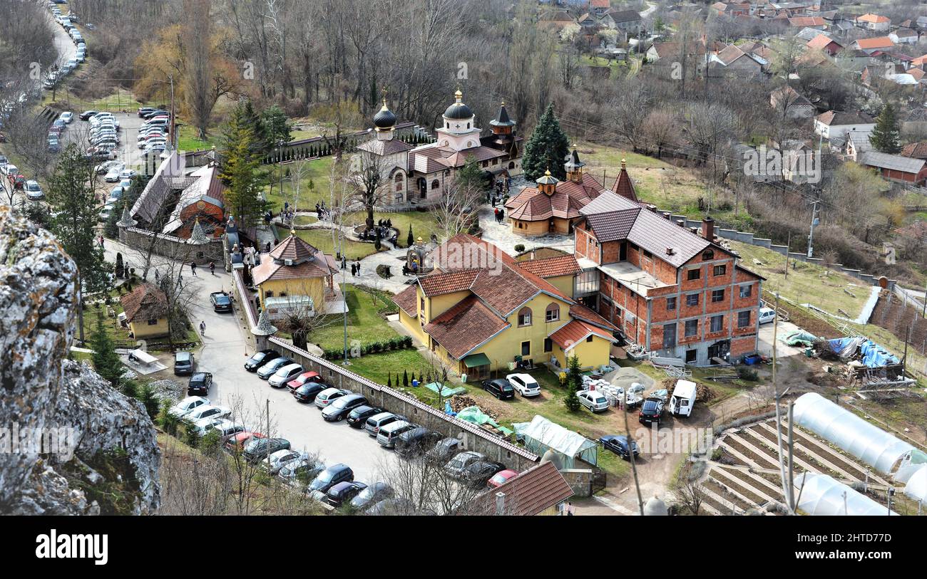 Bird's eye view of the monastery complex surrounded by parking lots and ...