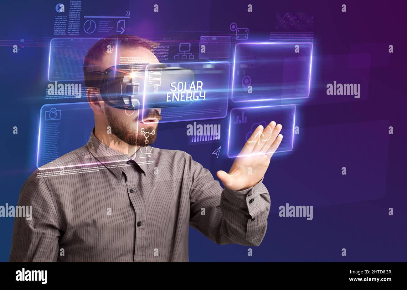 Businessman looking through Virtual Reality glasses, tech concept Stock ...