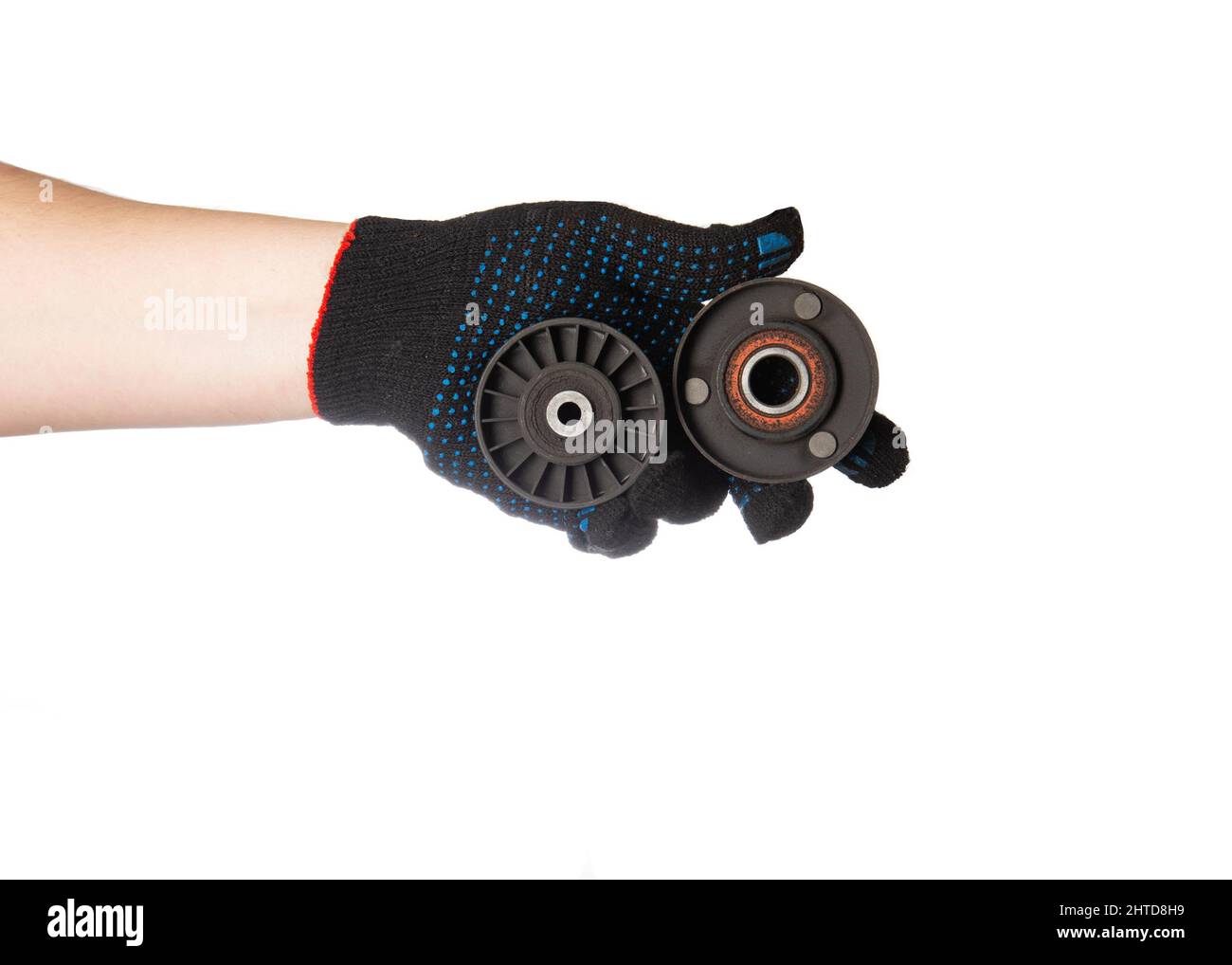 Two old rollers of the timing system from the car in the hand of a car ...