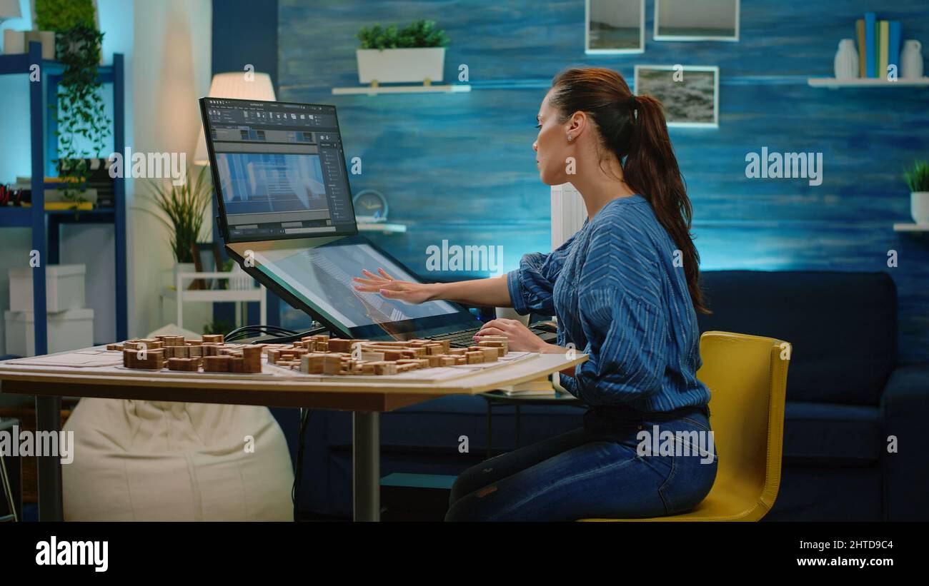 Engineer Woman Analyzing Virtual Maquette On Computer Designing Blueprint Plan For Construction