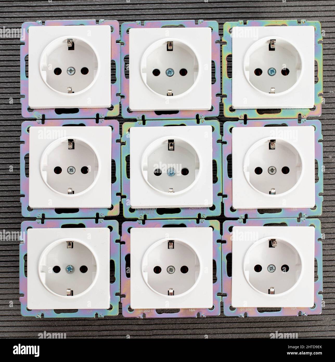 Background from home electric sockets, close-up. The concept of tariffs ...