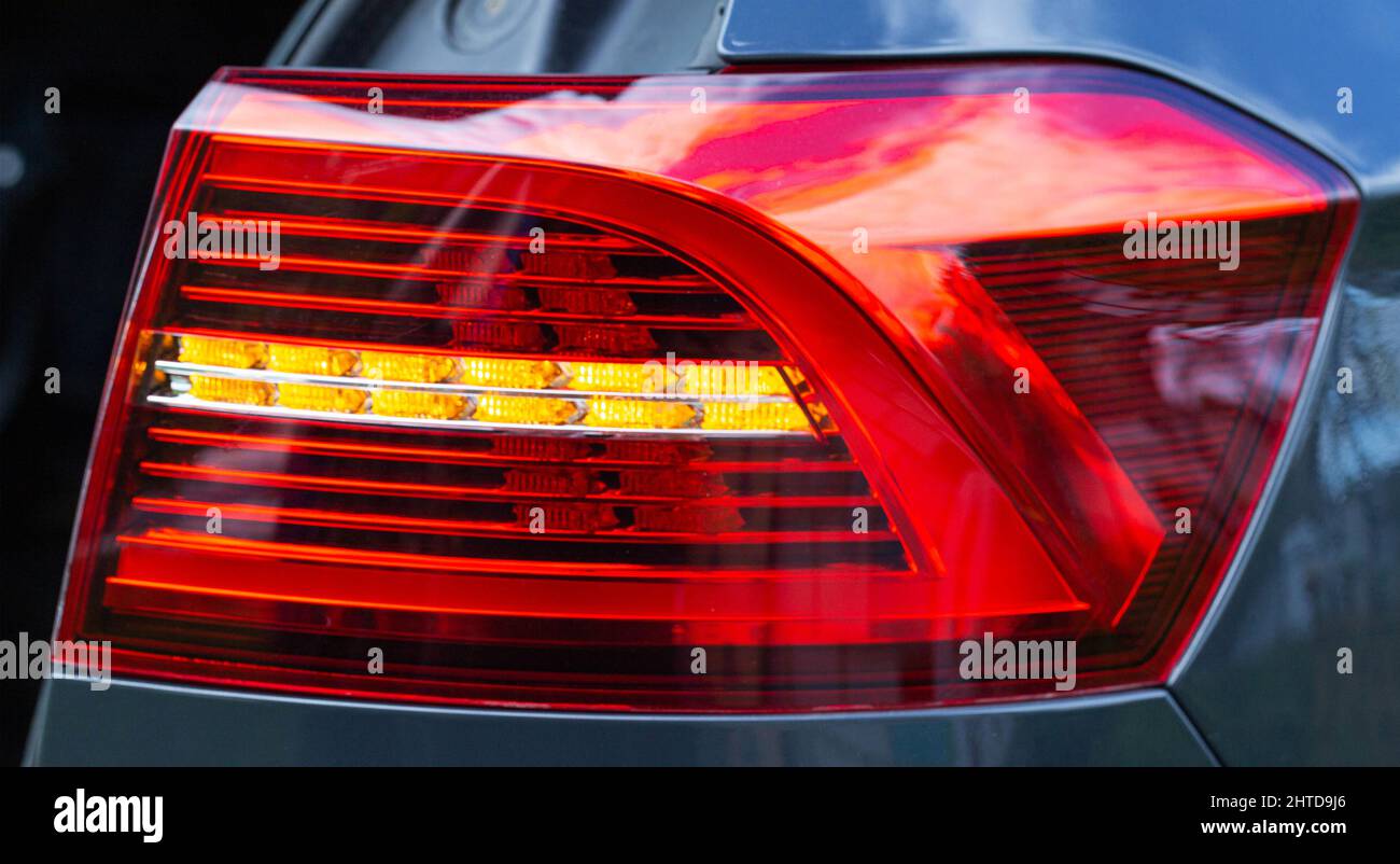 LED turn signal in the rear brake light of the car. Modern car lantern ...