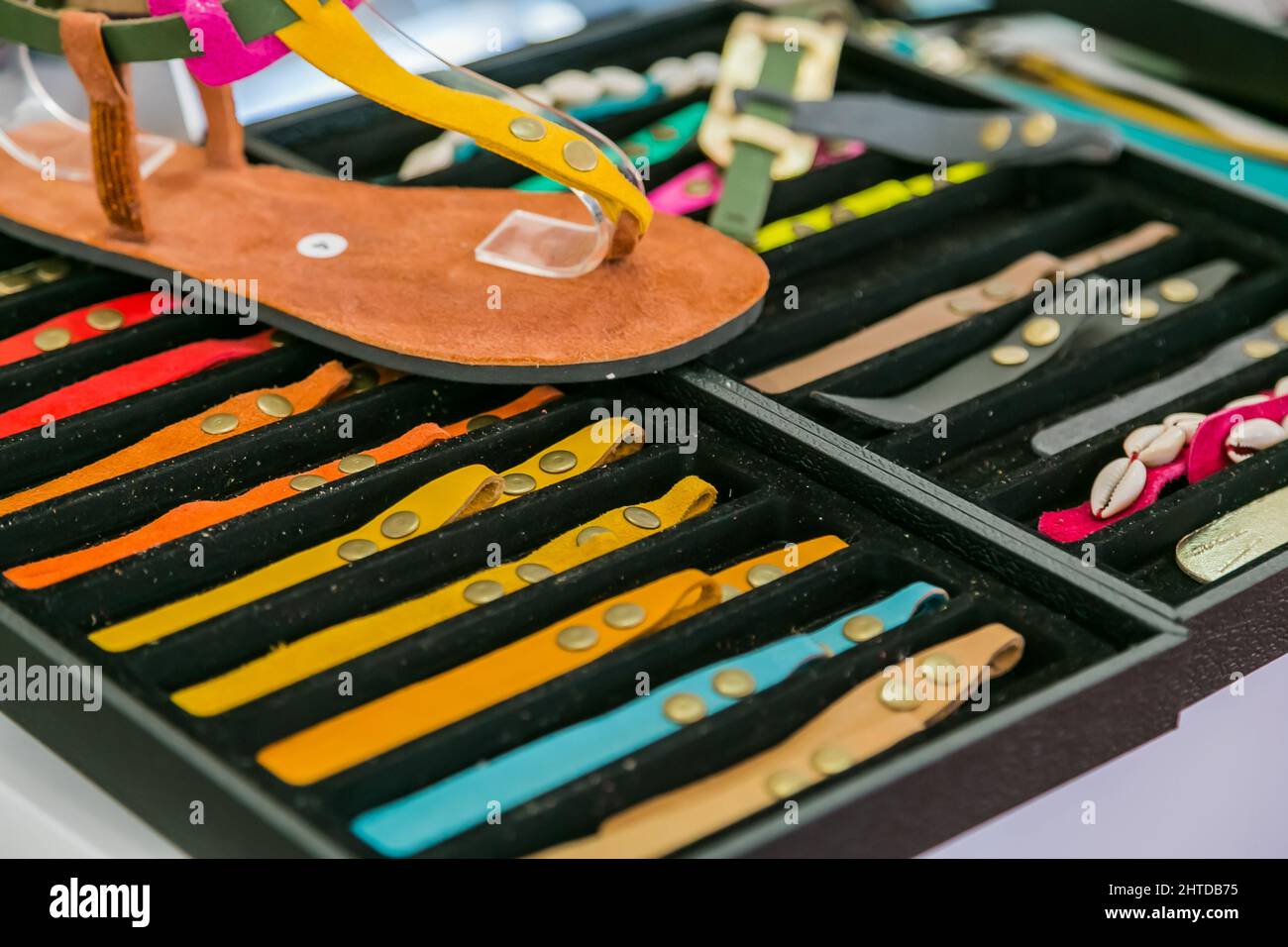 Bamboo sandal on set of colorful sequoia T-Straps on a display at ...