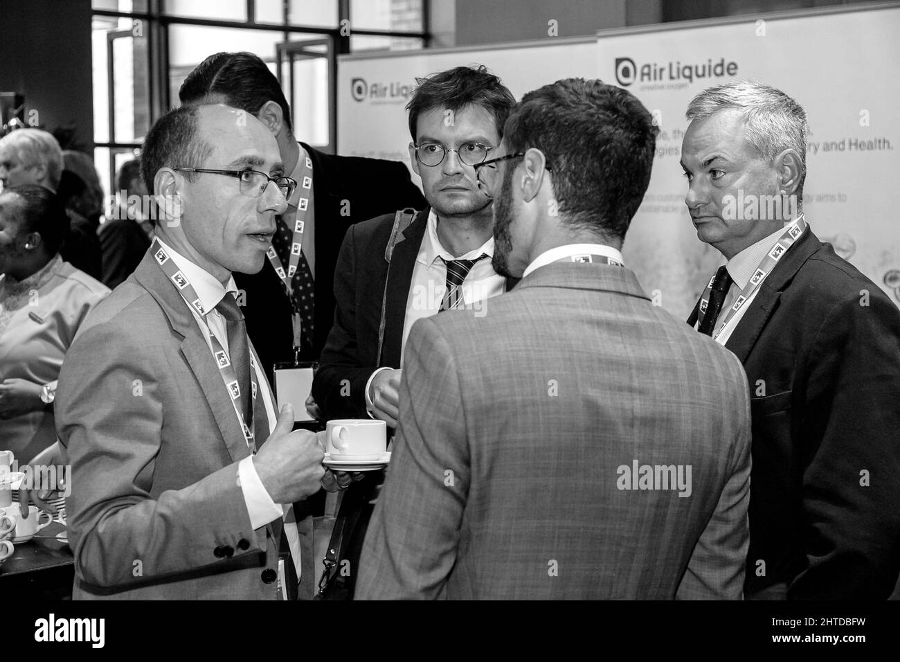 Delegates attending a business forum at the conference center in ...