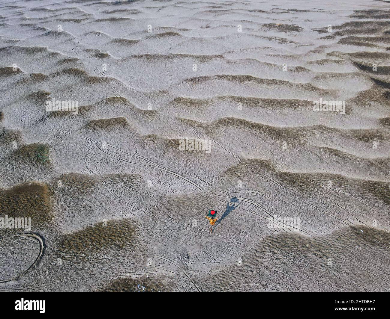 Aerial view of the white sandbars and the person walking on it Stock ...