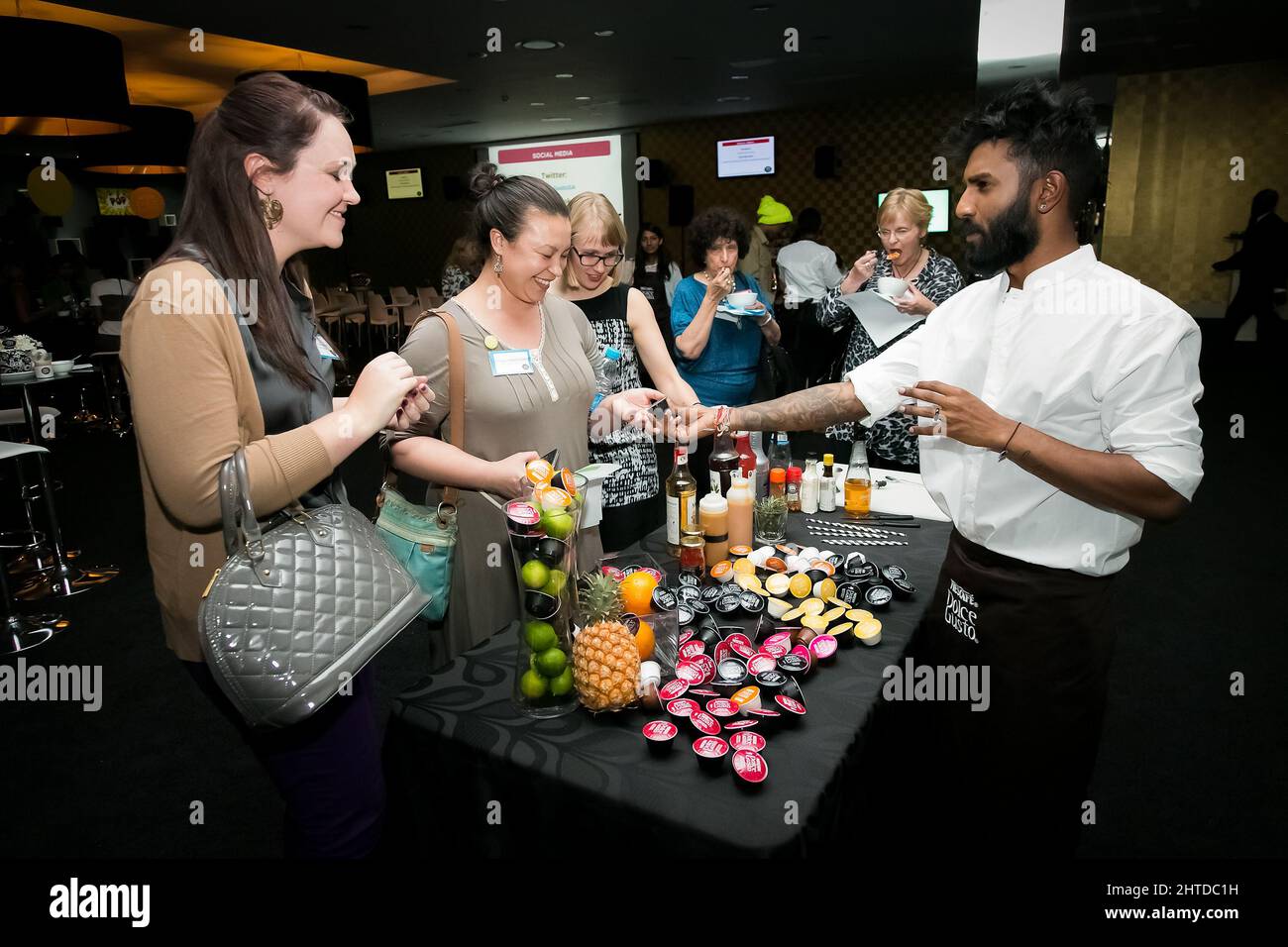 Group of people enjoying the Nescafe Dolce Gusto product launch event ...