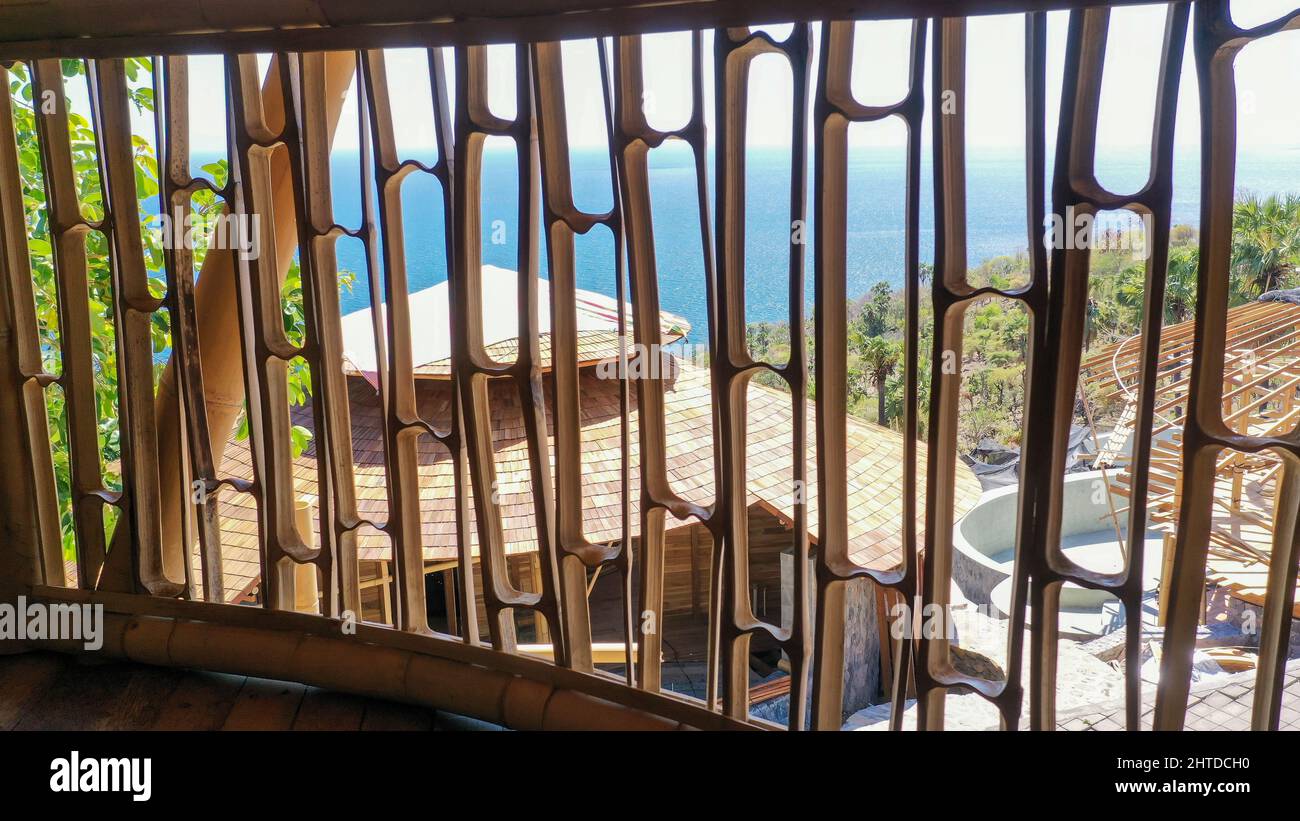 Golden Yellow ornamental Bamboo Railing. Curved staircase with an Asian ...