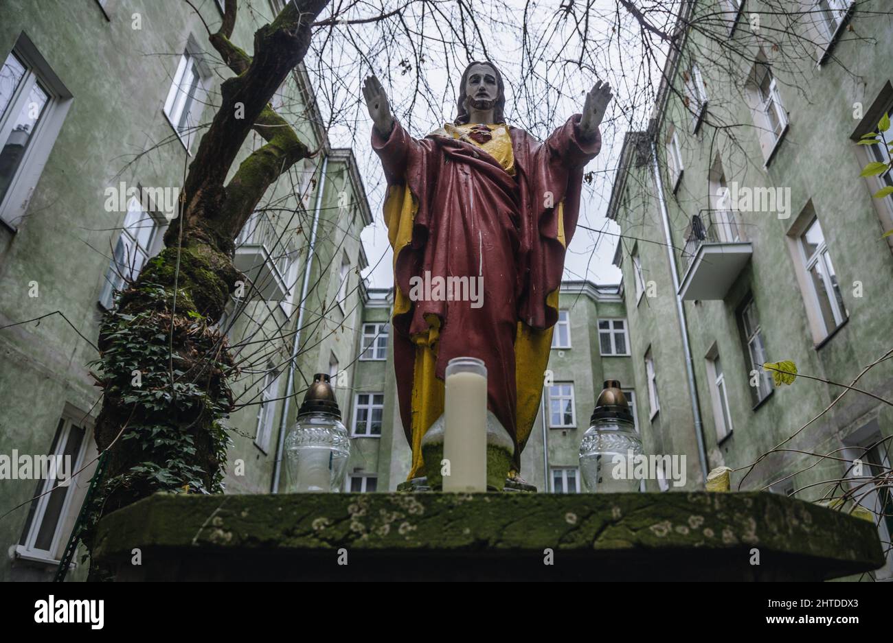 Jesus Christ statue on the inner court of old tenement house on Targowa ...