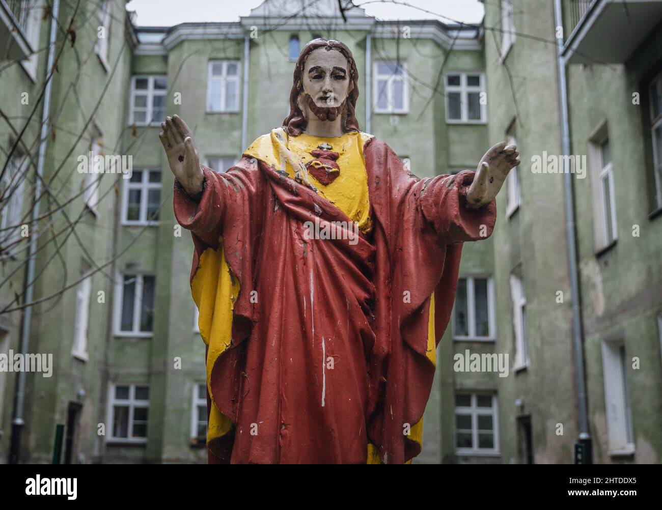 Jesus Christ statue on the inner court of old tenement house on Targowa ...
