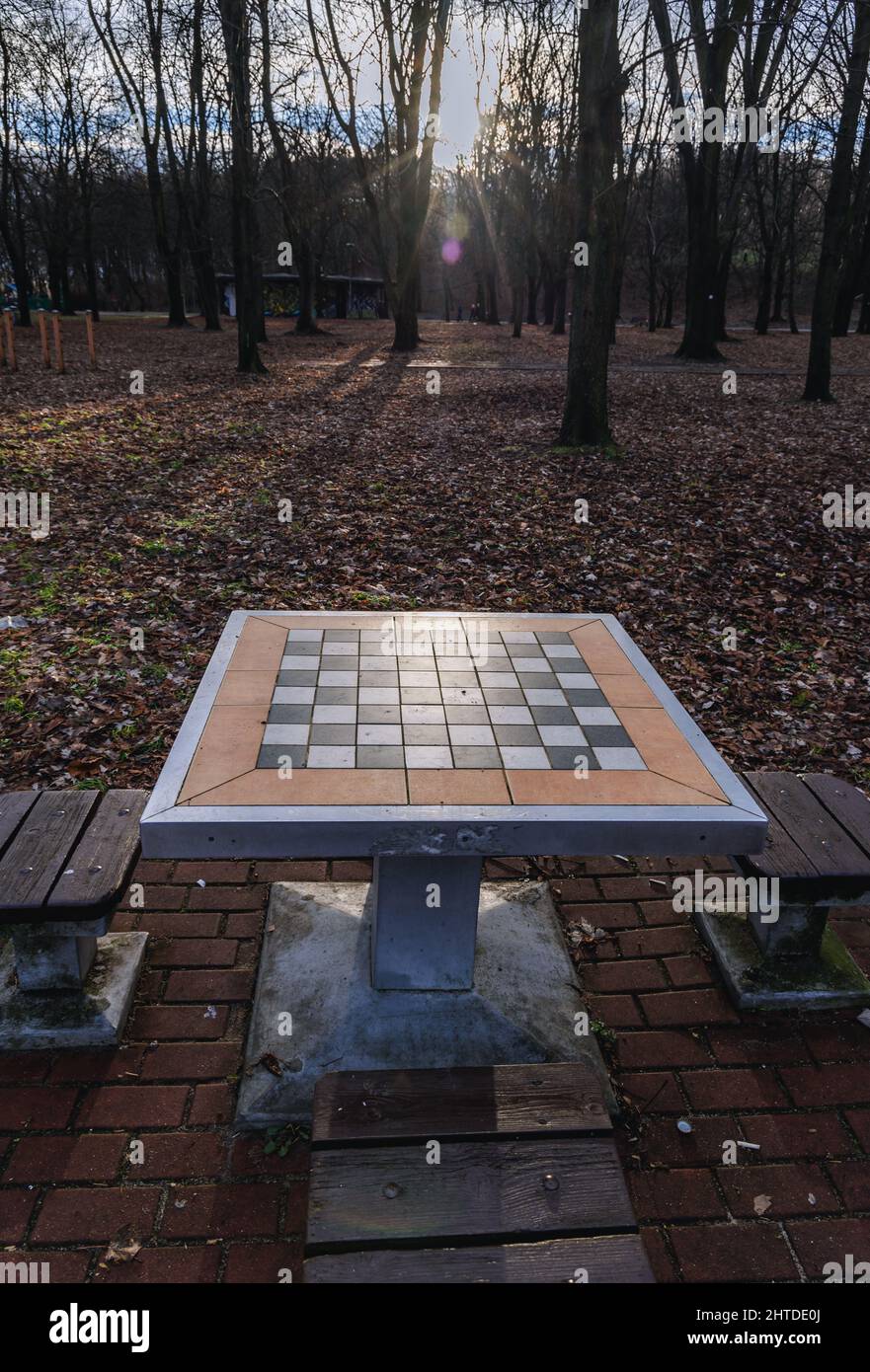 Outdoor table with chess board in Szczesliwicki Park in Warsaw, capital ...