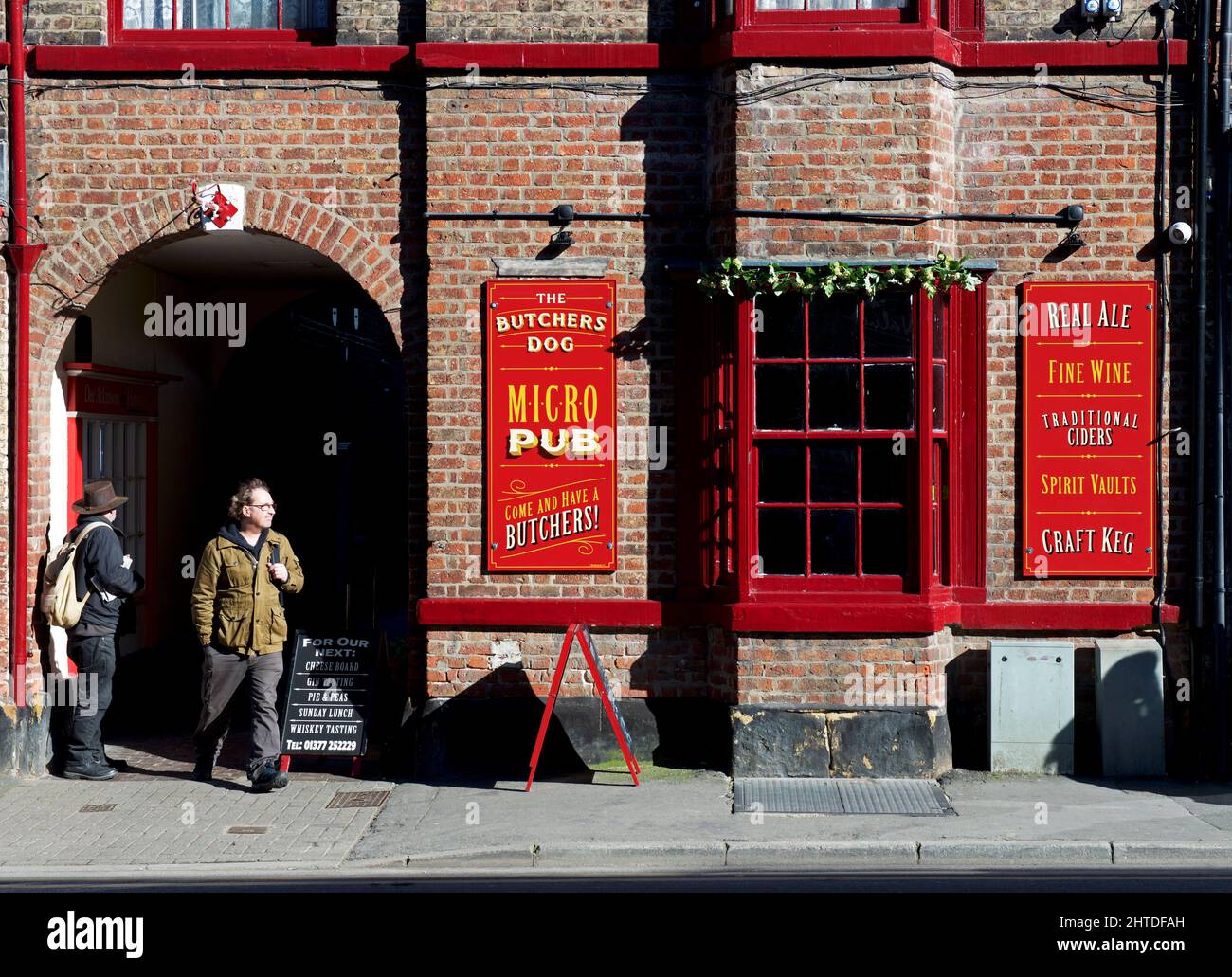 Waiting for the pub to open in Driffield, East Yorkshire, England UK ...