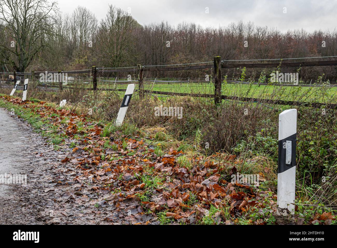 A fenced area in the field captured in autumn on a rainy day Stock ...