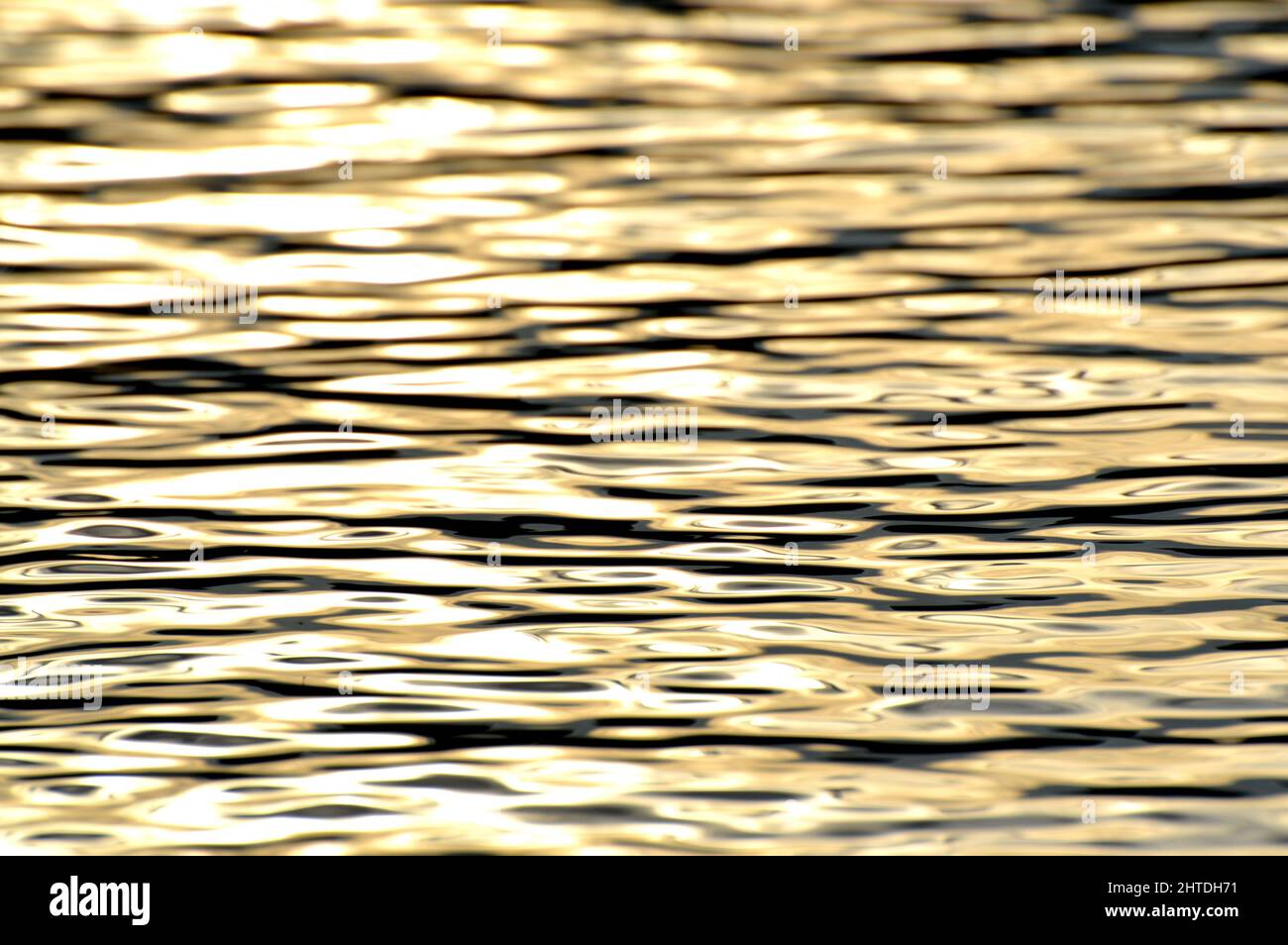Golden ocean water, photo background. Beautiful summer sea, sunset time ...