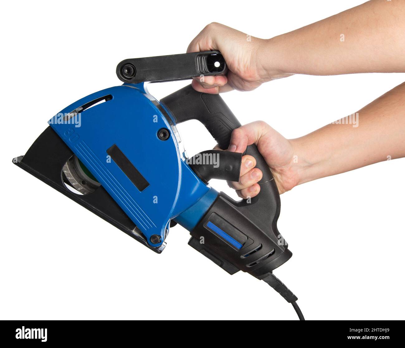 Electric wall chaser with diamond discs in the hands of a worker on a ...