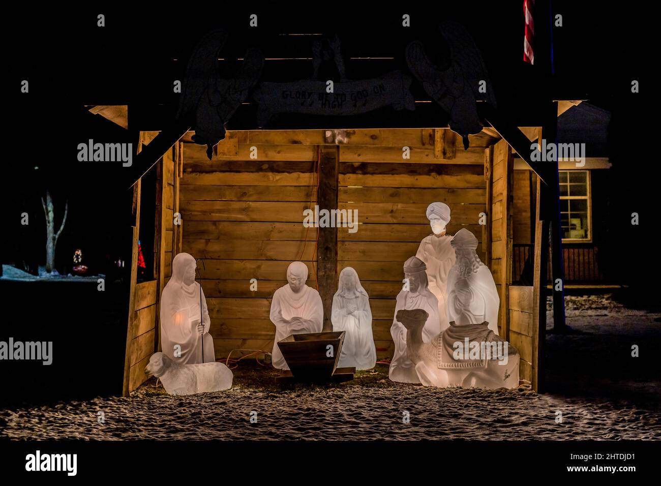 Jesus Christ holy night nativity statue in a snowy park at night Stock ...
