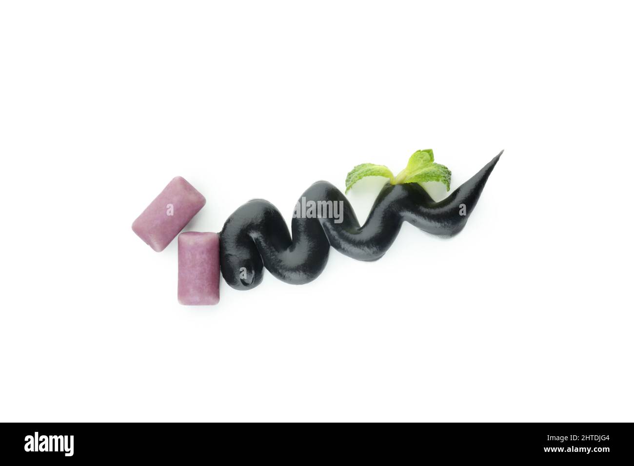 Black toothpaste, gum and mint isolated on white background Stock Photo ...