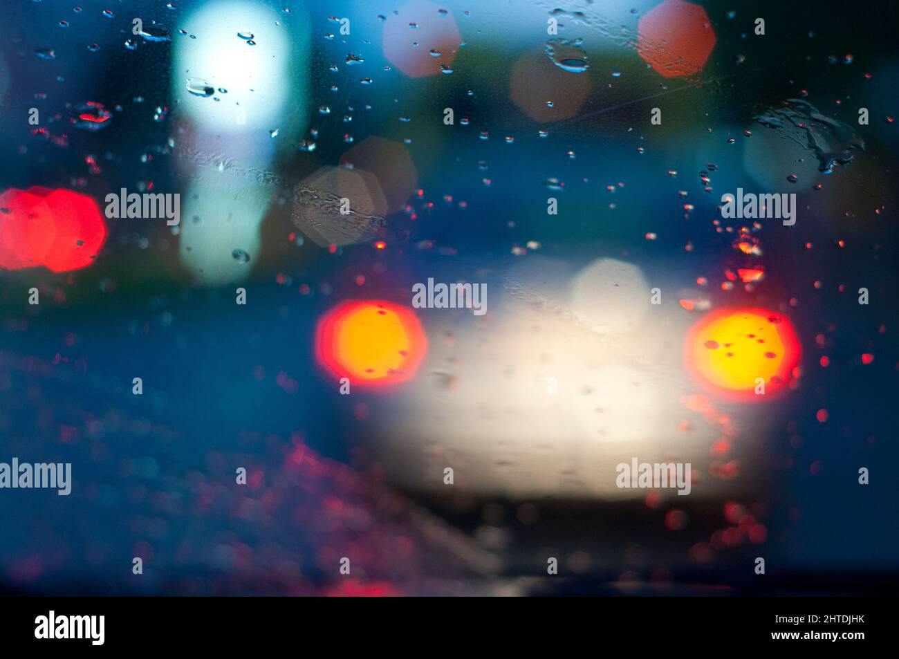 Close-up shot of abstract blurry traffic road bokeh light from inside a car Stock Photo - Alamy