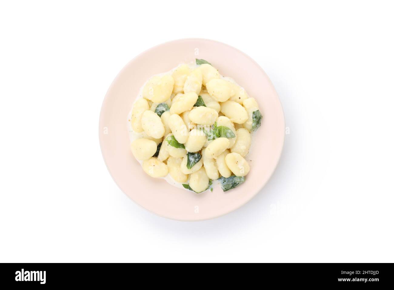 Plate with gnocchi isolated on white background Stock Photo - Alamy