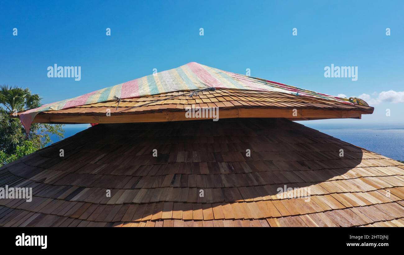 Close up rooftops with worn and weathered wooden shingles. Roof tiles ...