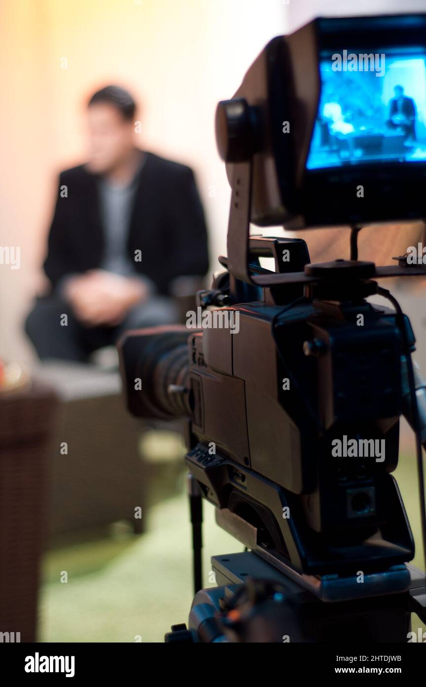 Vertical shot of a video camera viewfinder, recording show in a TV ...