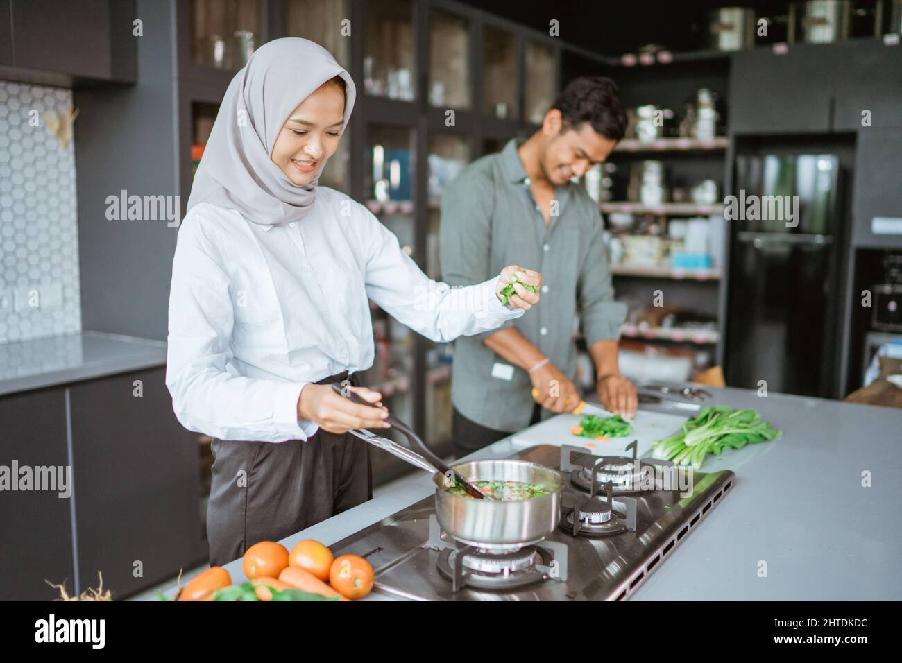 romantic young muslim couple have fun making food at home Stock Photo ...