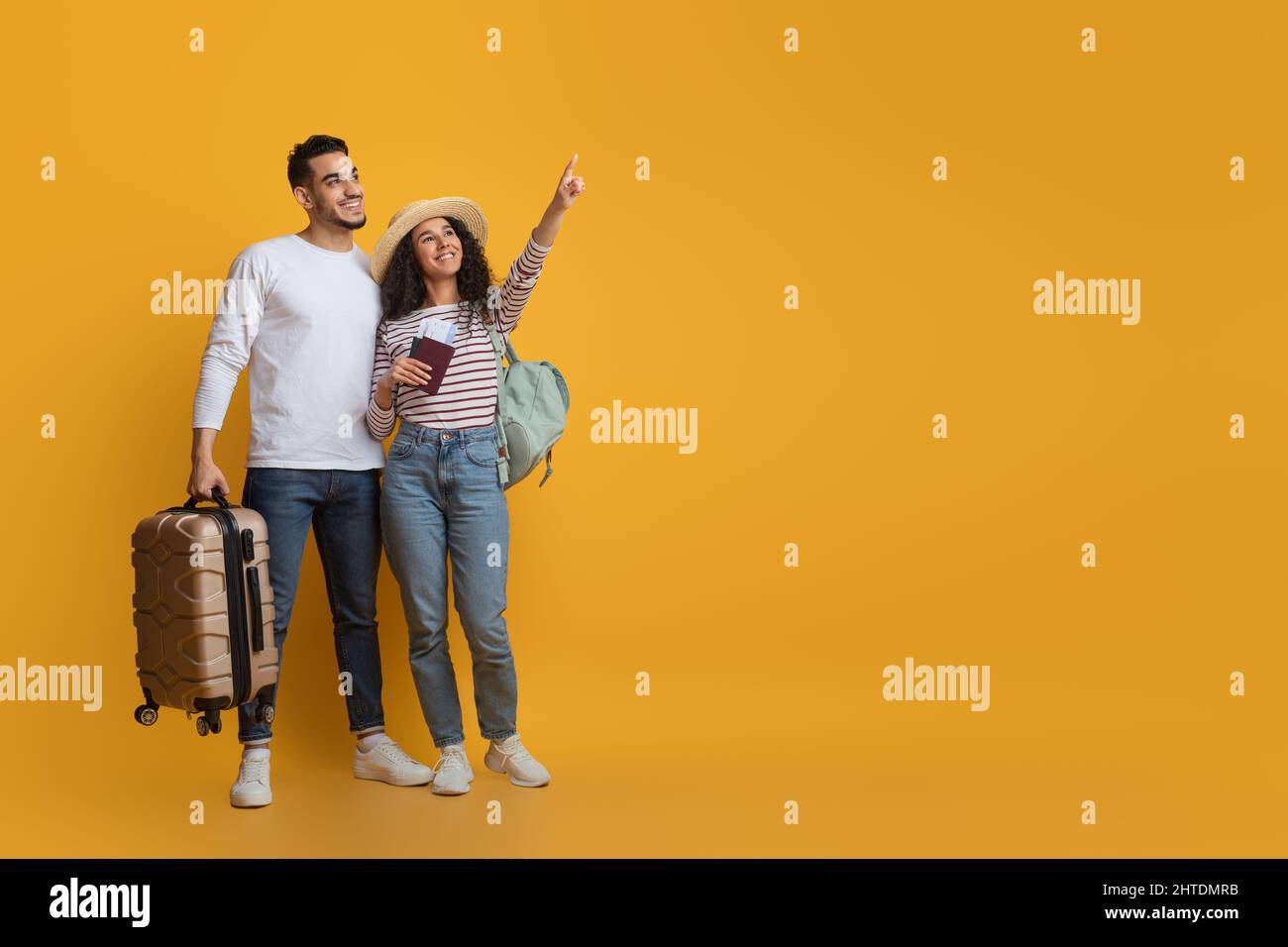 Vacation Offer. Happy Middle Eastern Couple With Suitcase And Passports ...