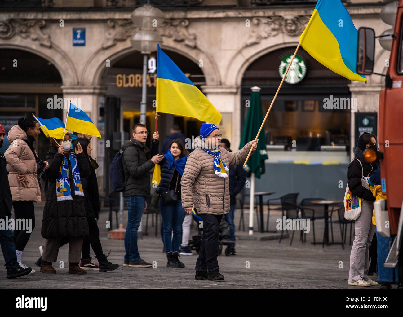 Ukrainian flags at anti war protest in Munich after Russia invaded ...