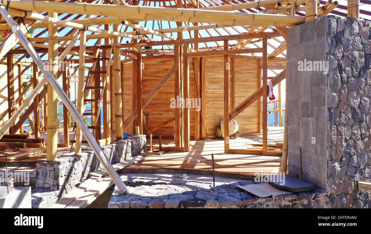 Inside a timber house under construction. Detailed photo of a wooden ...