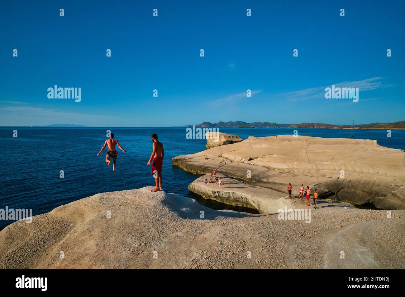 Jumping off cliff water hi-res stock photography and images - Alamy