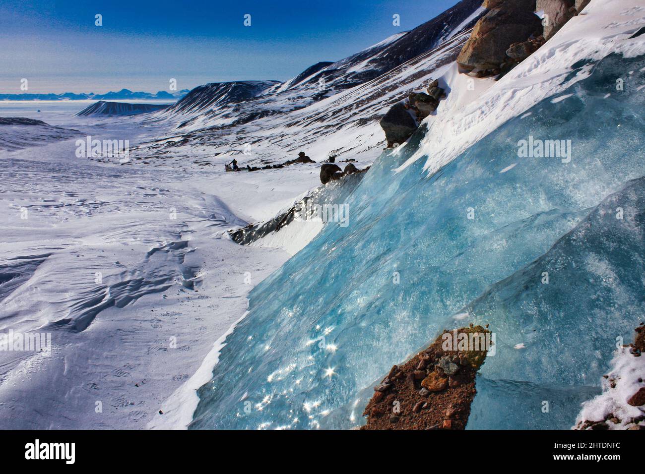 Closeup of an iceberg in a snowy landscape Stock Photo - Alamy