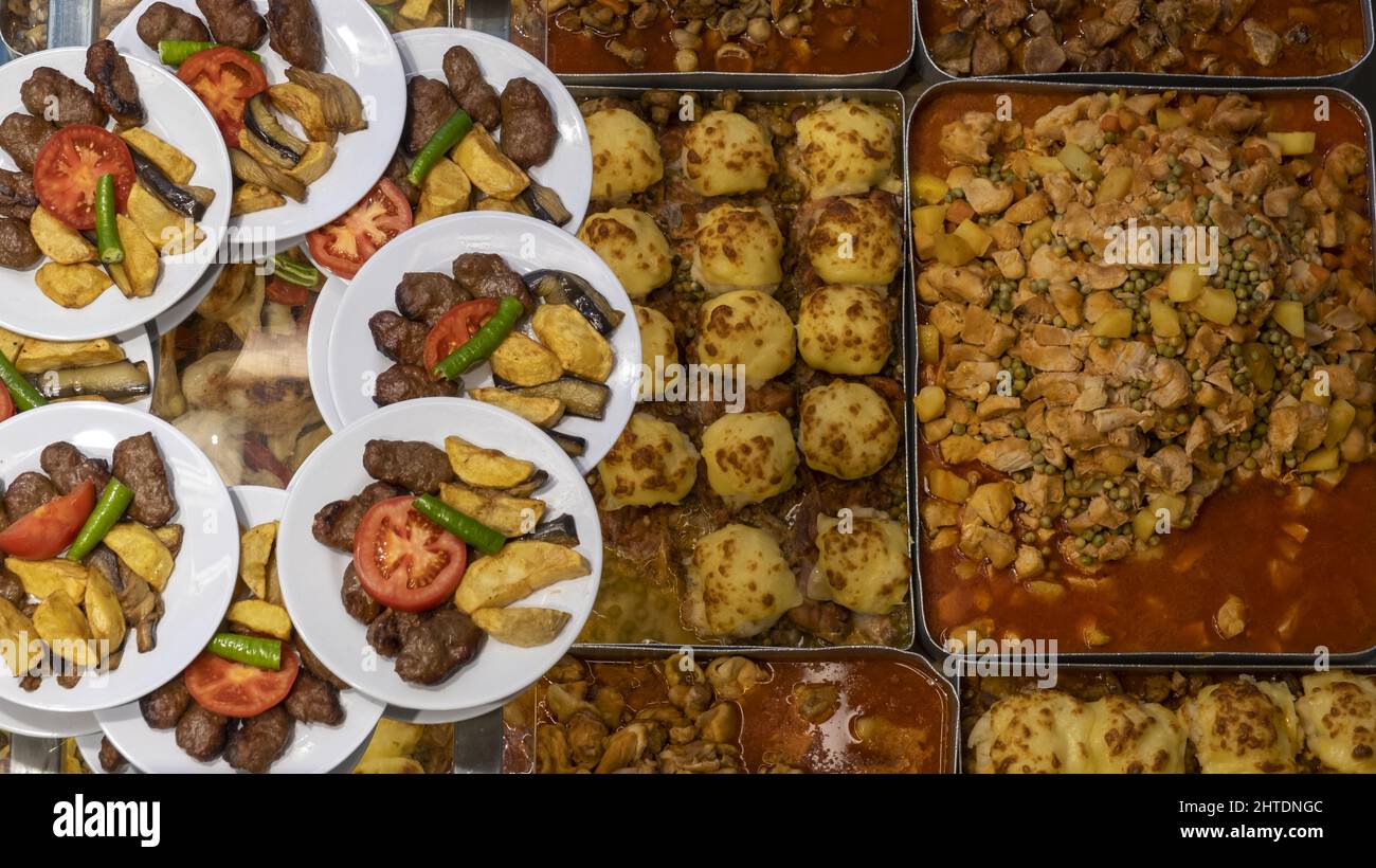 Top view of traditional Turkish food served in big trays at restaurant ...