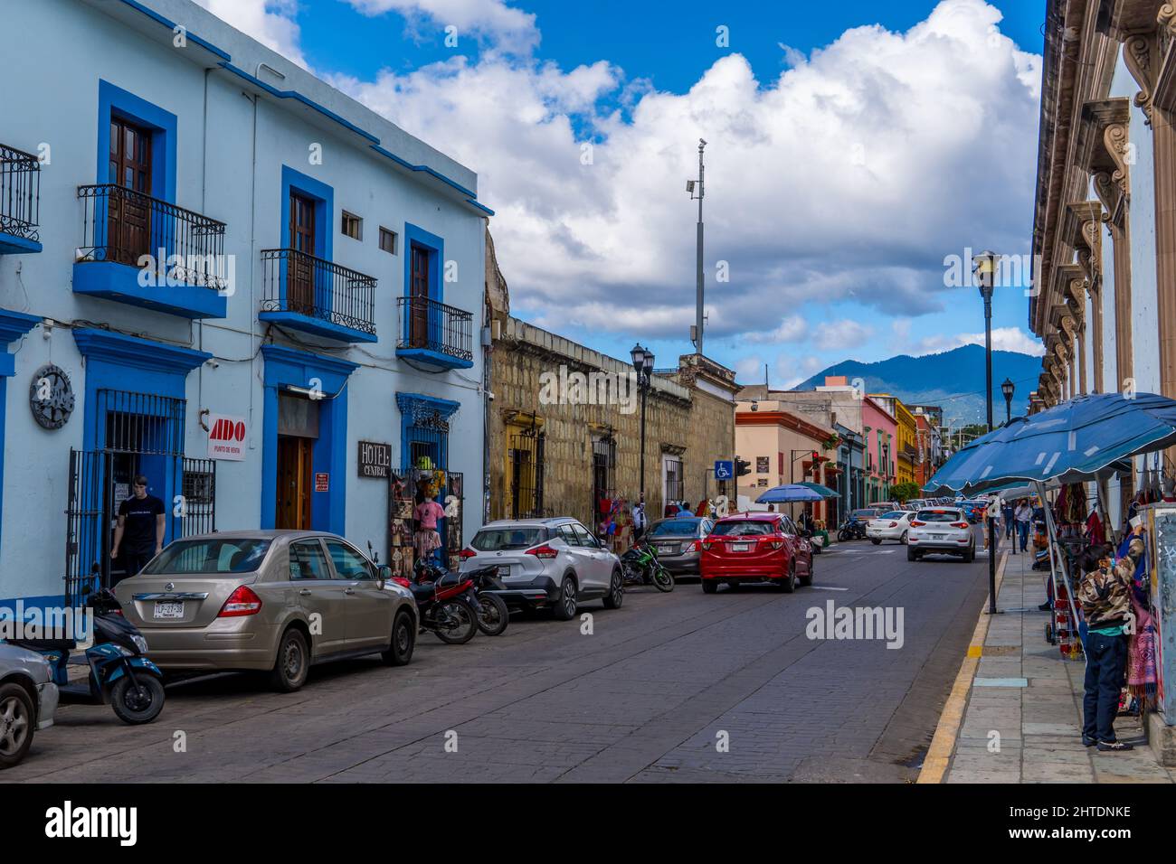 Photo of a street with traditional colonial architecture and cars Stock ...