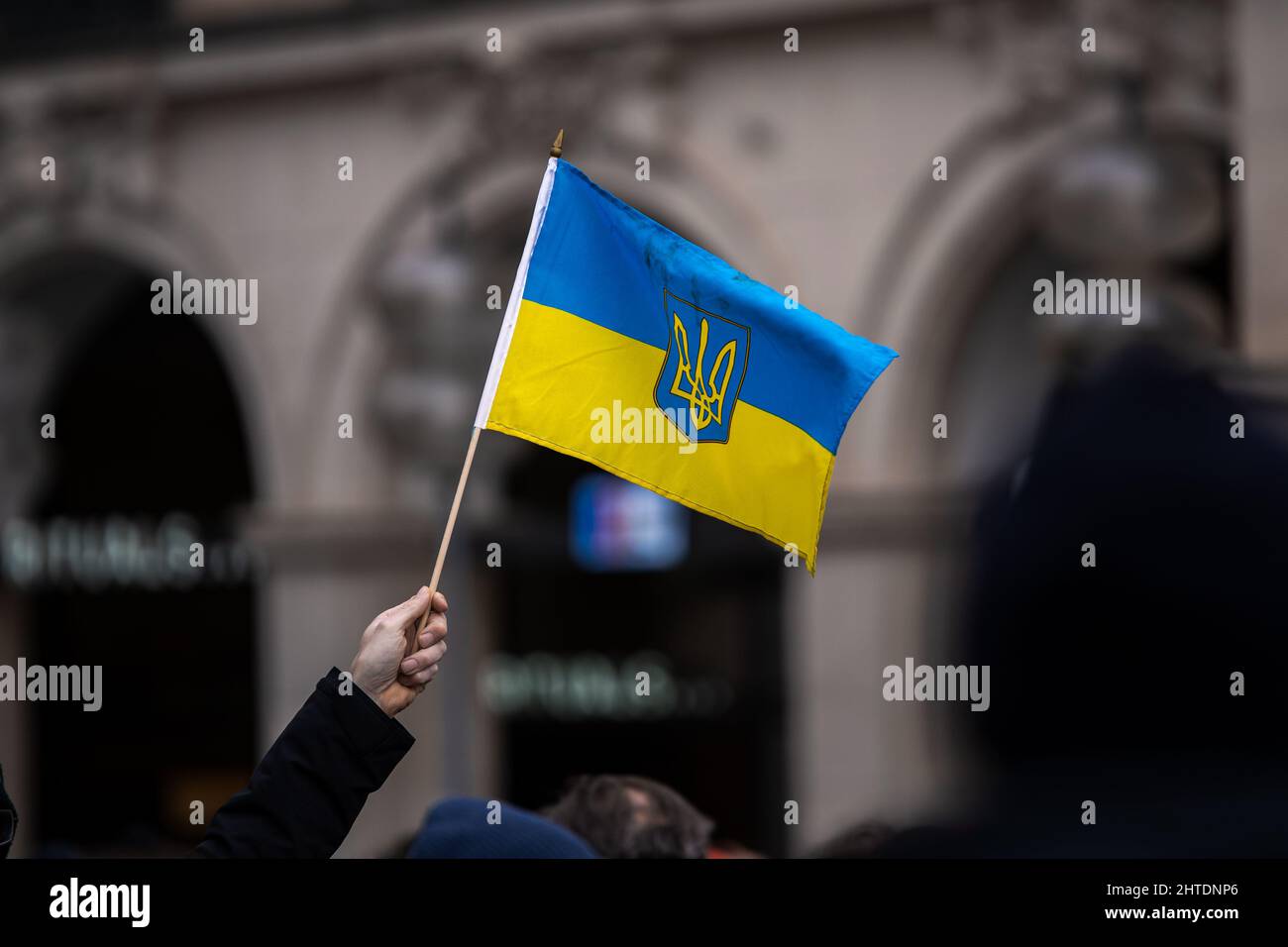 Ukrainian flags at anti war protest in Munich after Russia invaded ...