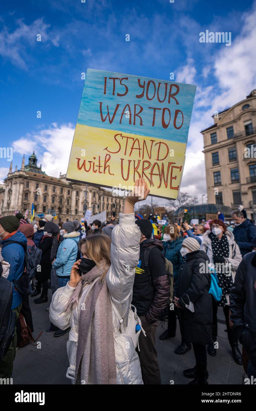 Posters with the slogan "Stand with Ukraine" at peace demonstration in ...