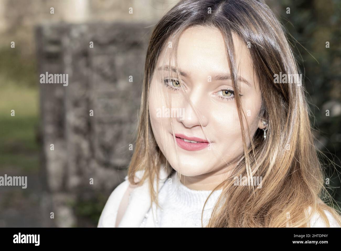 A portrait of a pretty young woman with fair hair and pretty facial ...