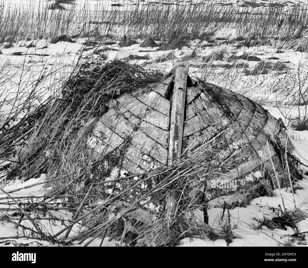 Black and white photo of an object in a field covered with snow Stock ...