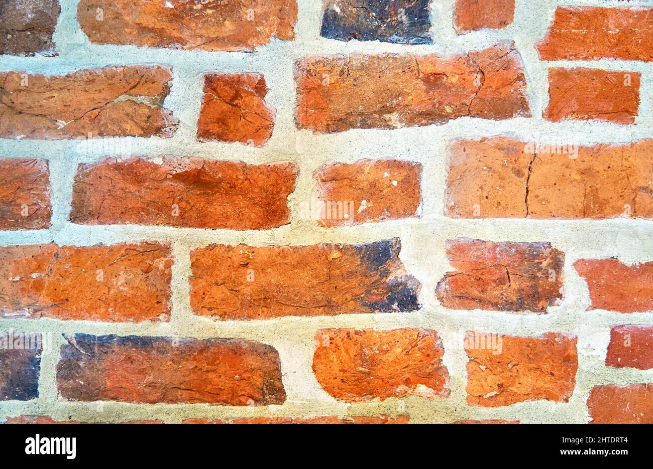 Close up of red aged brick wall as abstract background texture with old ...
