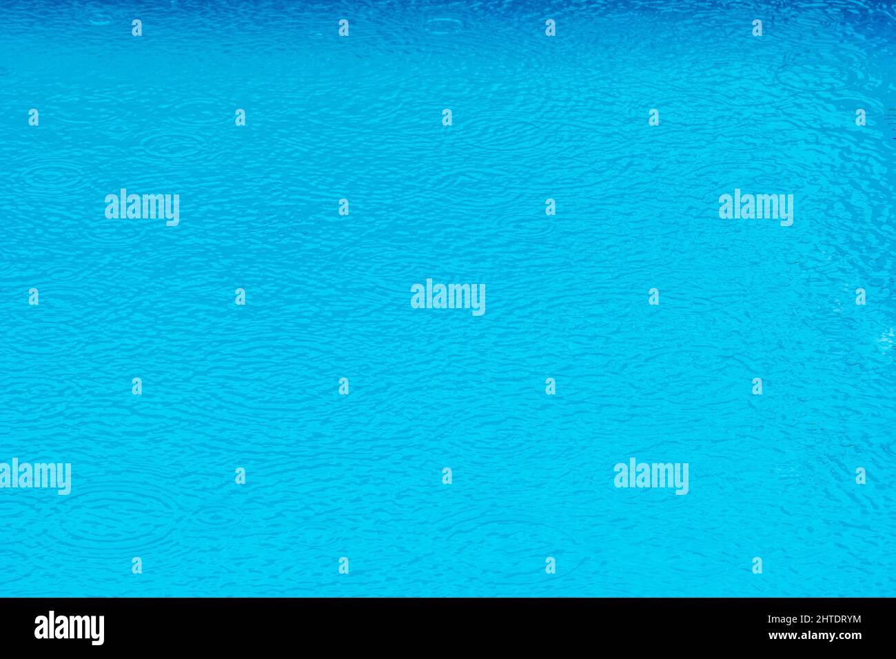 Clear blue pool water background Stock Photo - Alamy