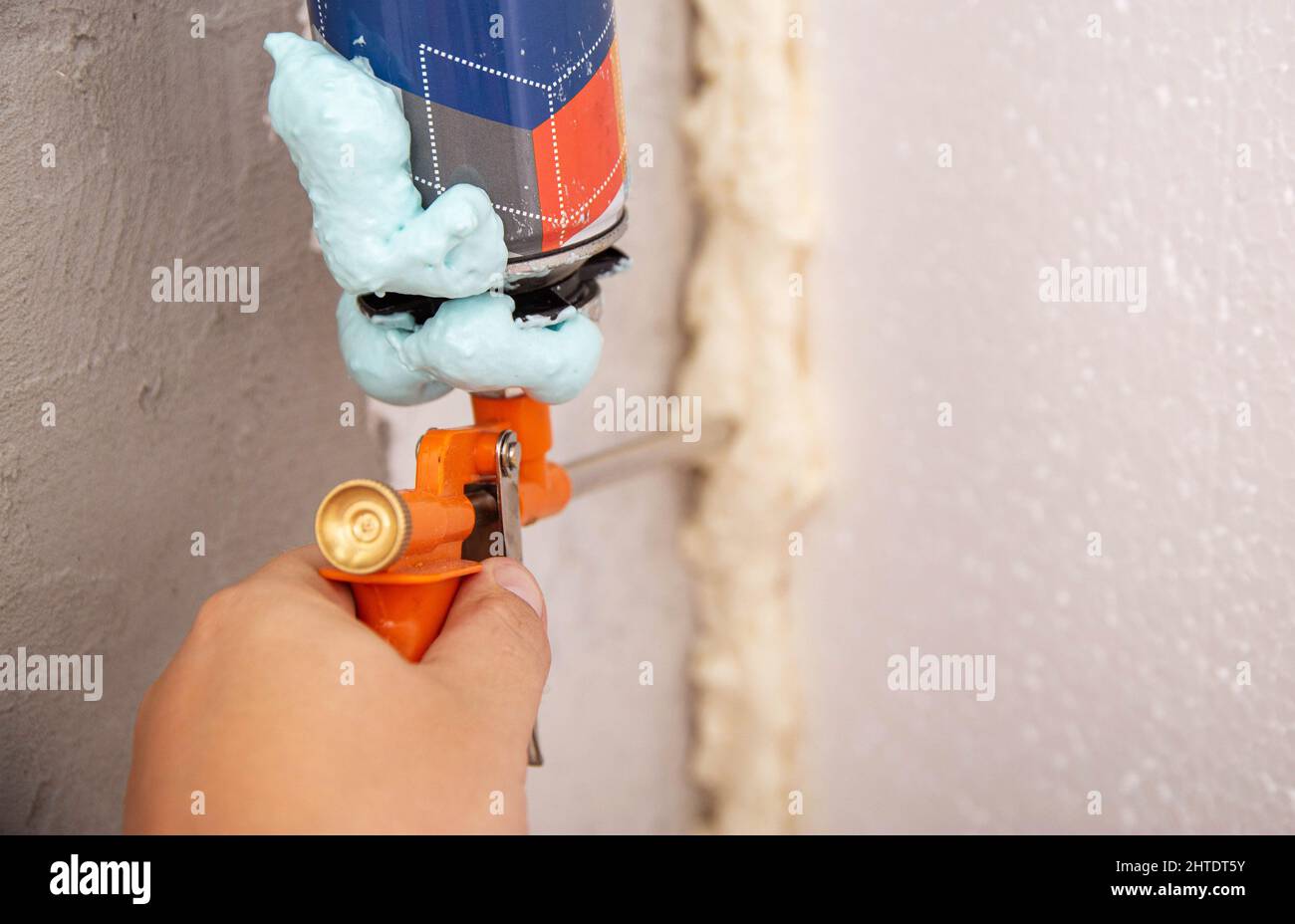 Construction foam gun with a defective cylinder. Foam bottle defect ...