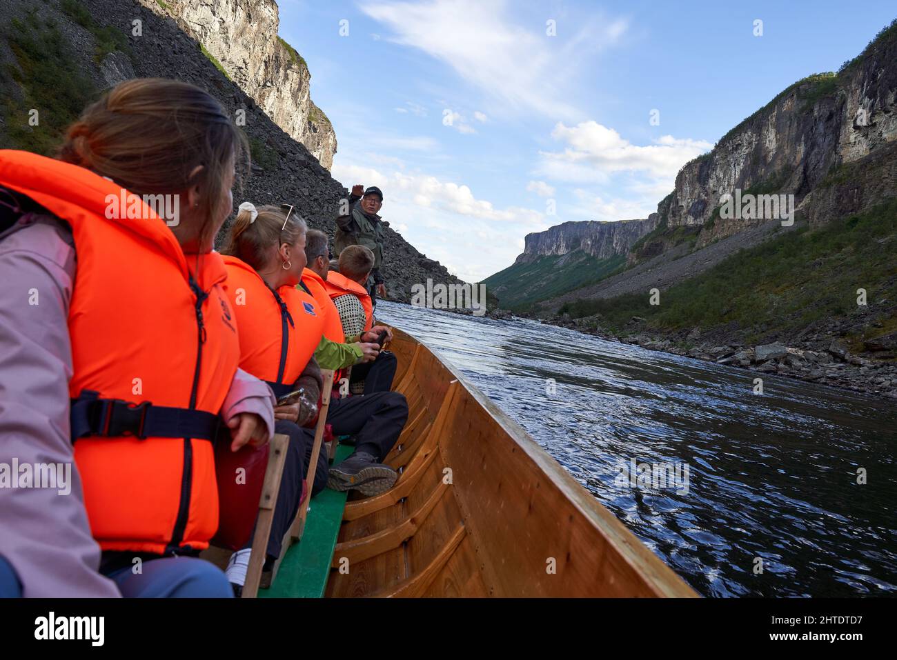 Boat ride with a long wooden boat with a guide on the Alta River in ...